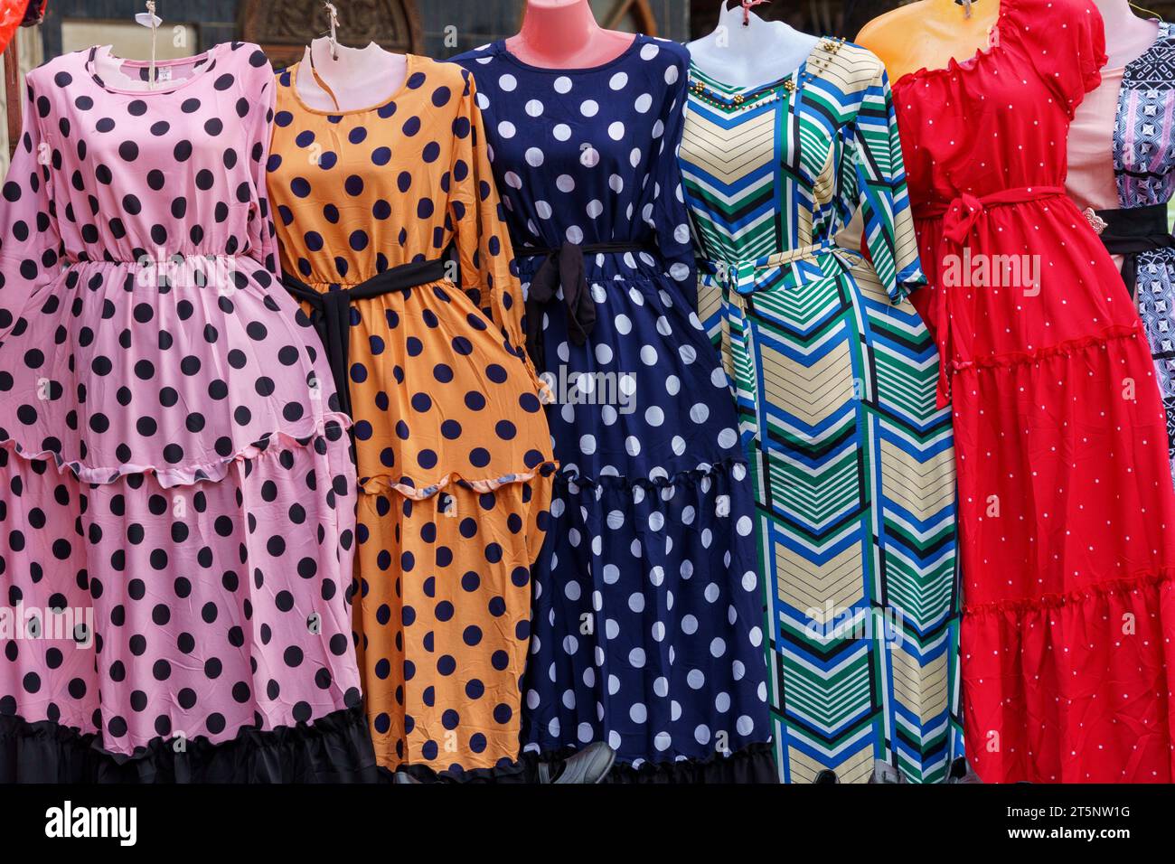 female manequins displaying ladies dresses with a variety of designs ...