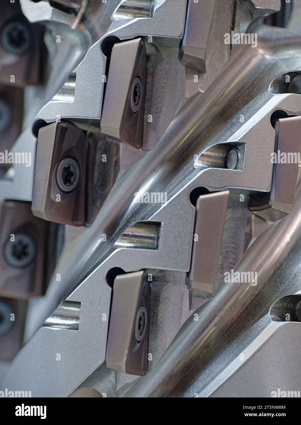 Milling cutter, metalworking rotary tool, close-up shot. Abstract ...