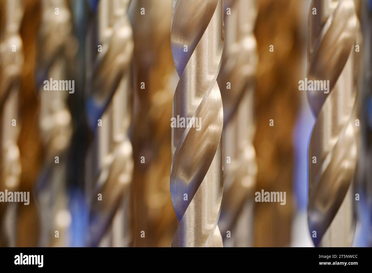 Group of drills, metalworking rotary tools, close-up shot, selective ...