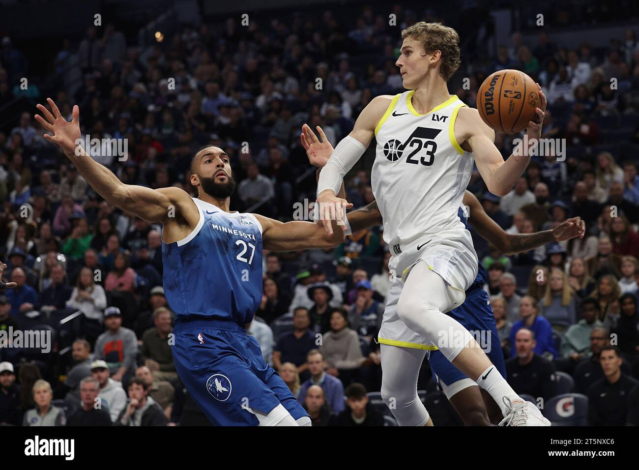 Utah Jazz forward Lauri Markkanen (23) rebounds against Minnesota Timberwolves center Rudy ...