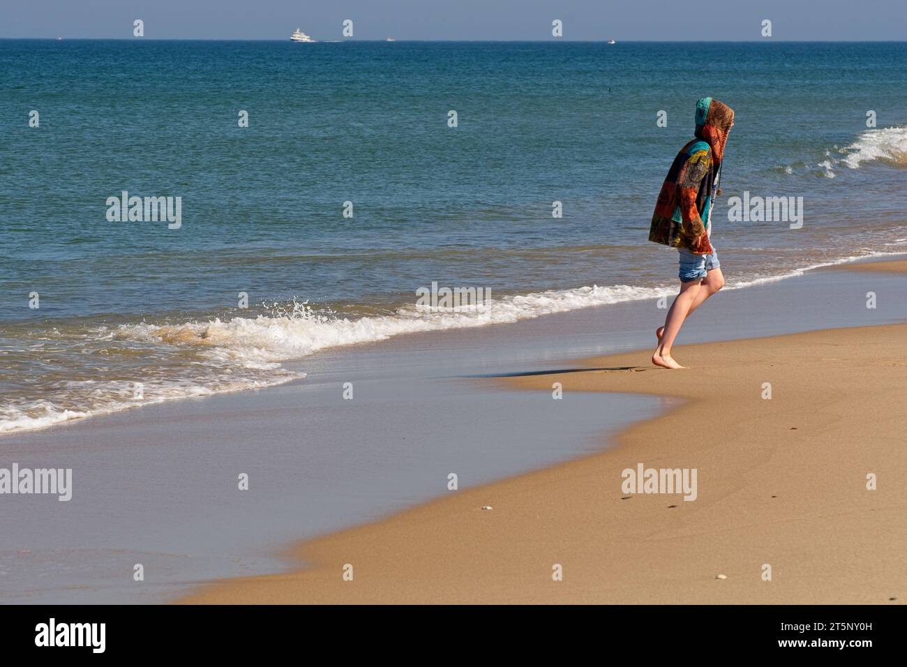 Solitary walker along Cape Cod National Seashore beach in October Stock ...