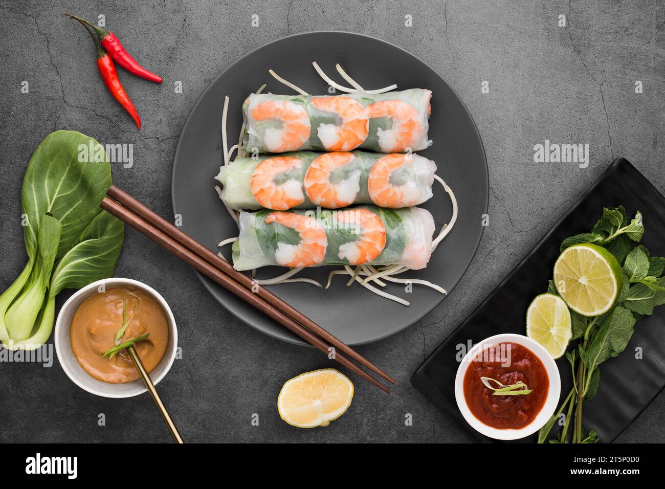 Flat lay shrimp rolls with chopsticks sauce Stock Photo - Alamy