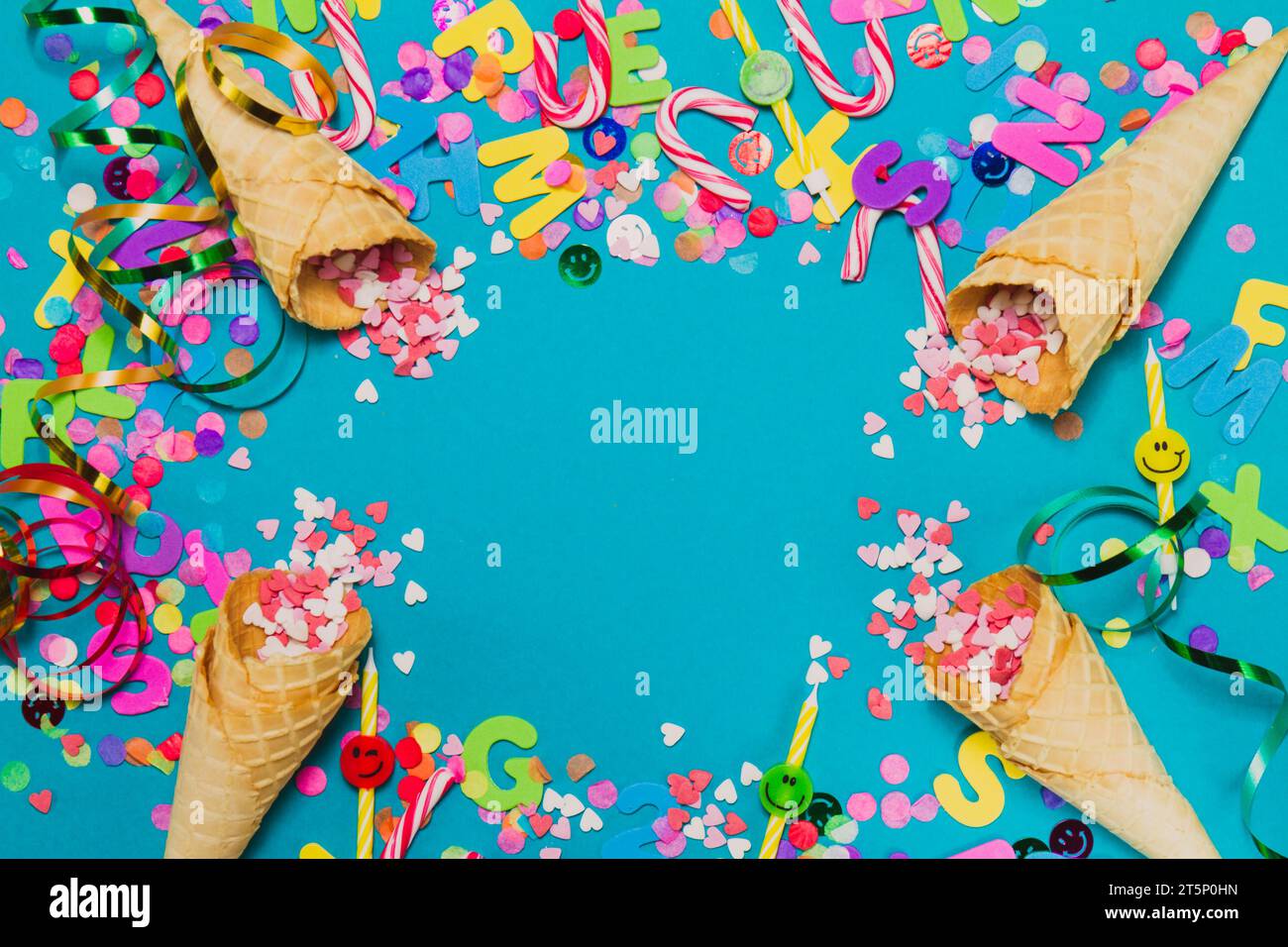 Ice cream cones with hearts confetti blue background Stock Photo - Alamy