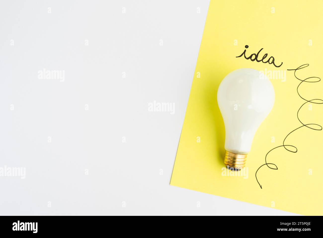 Idea text written adhesive note with light bulb white background Stock ...