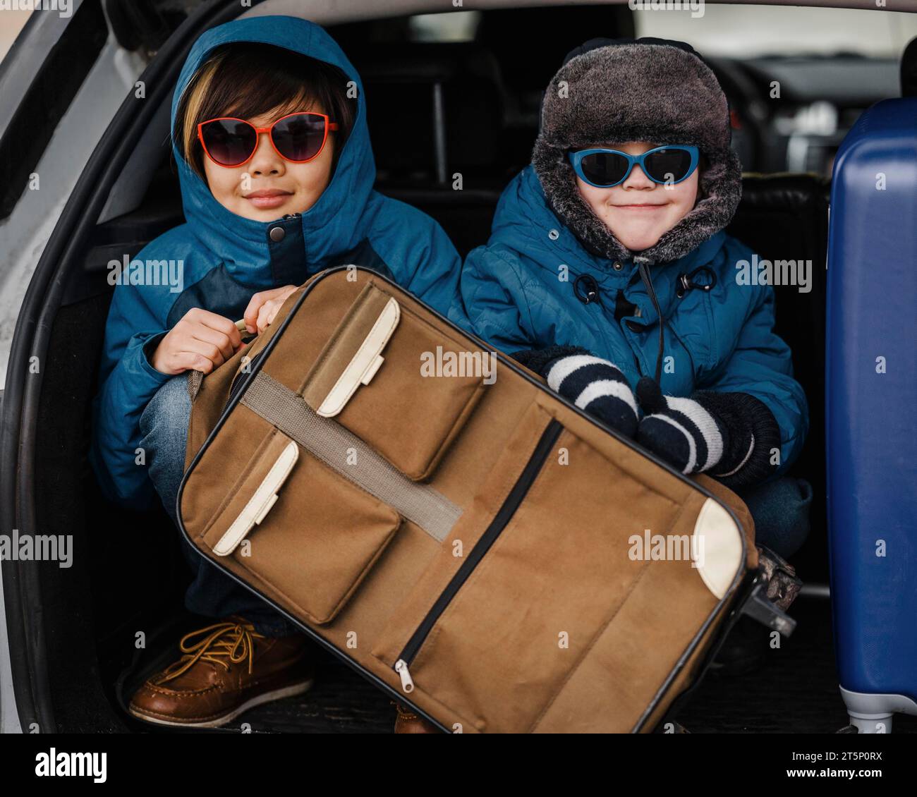 Medium shot kids wearing sunglasses Stock Photo - Alamy