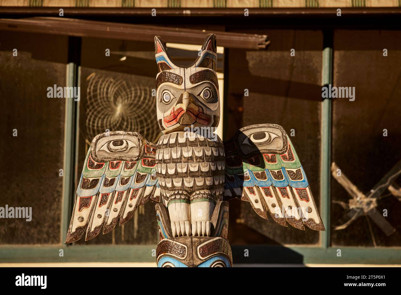 Skagway a compact city in southeast Alaska, Native totem pole outside ...