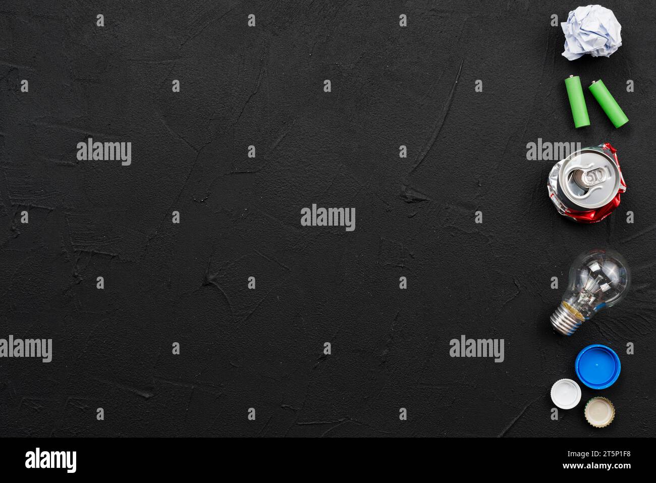 Set reusable trash black surface Stock Photo - Alamy