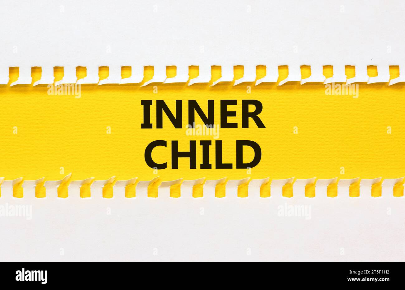 Inner child symbol. Concept words Inner child on beautiful yellow paper ...