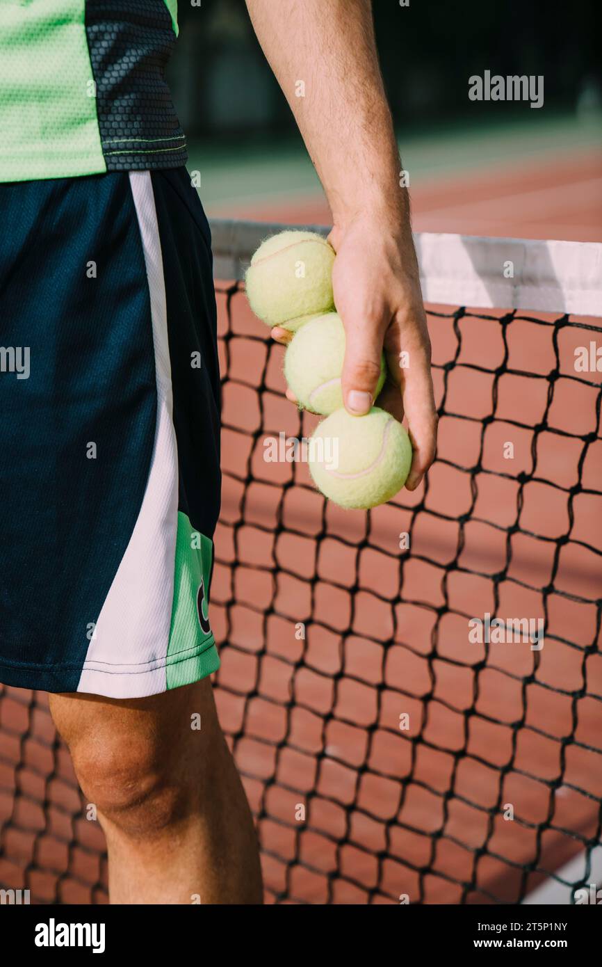 Three tennis balls racket hi-res stock photography and images - Alamy