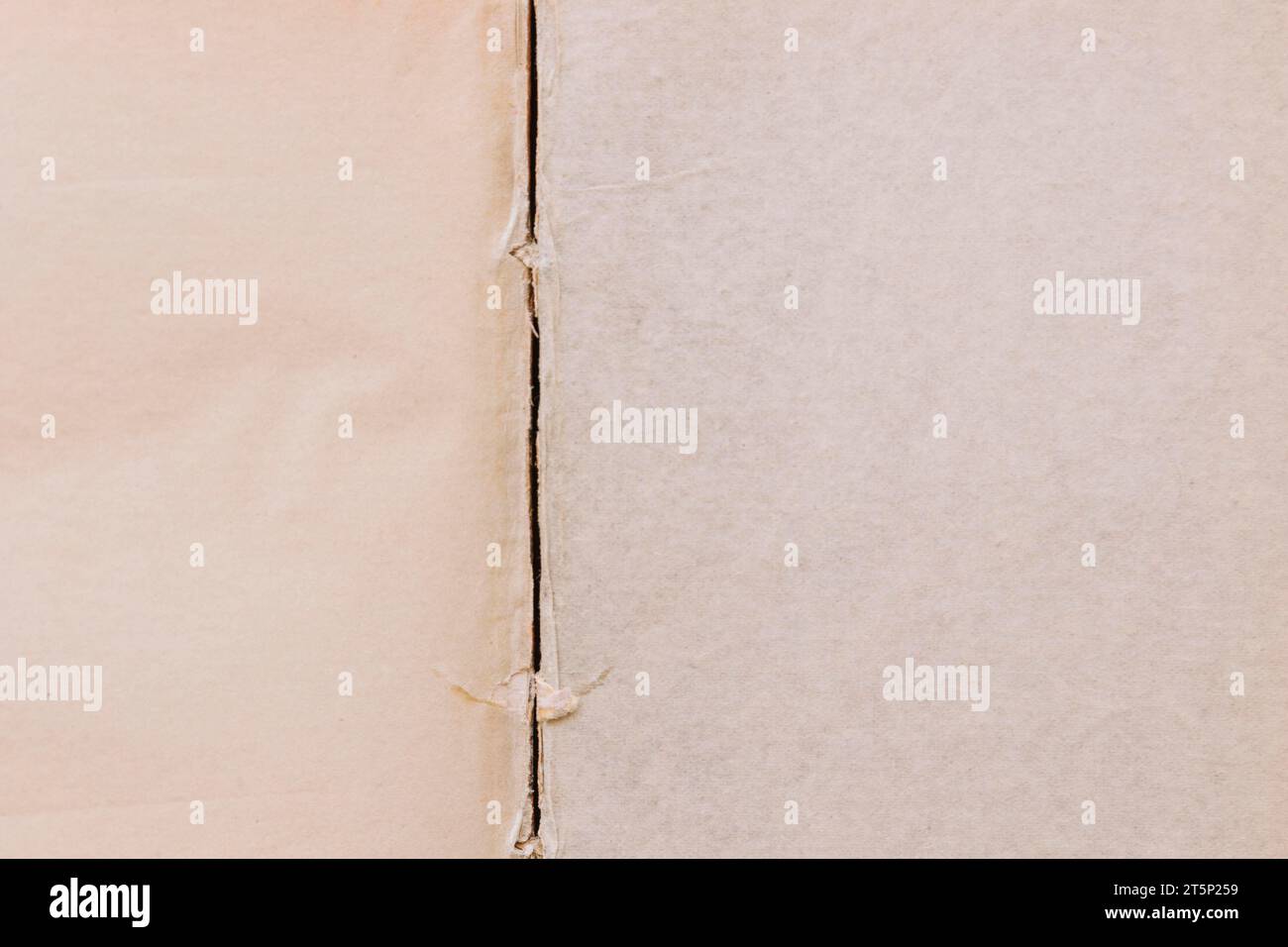 Torn line old two paper textured surface background Stock Photo - Alamy