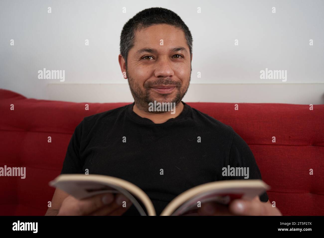 Man Reading a Funny Book, Bursting into Laughter Stock Photo - Alamy
