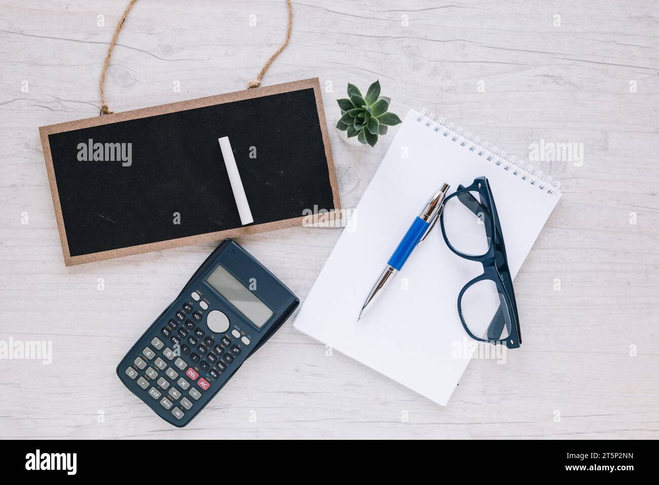 Arranged objects desktop realtor Stock Photo - Alamy