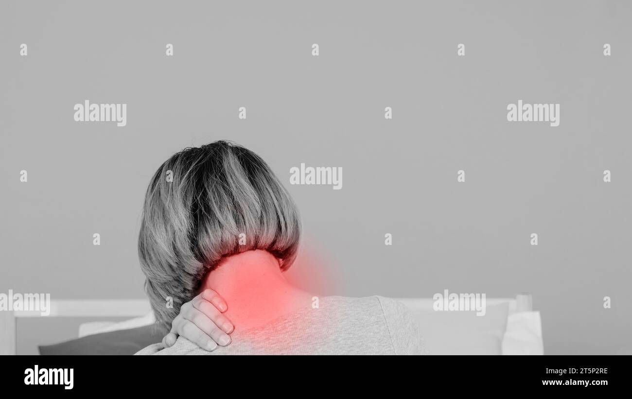 Back view woman with sore neck Stock Photo - Alamy