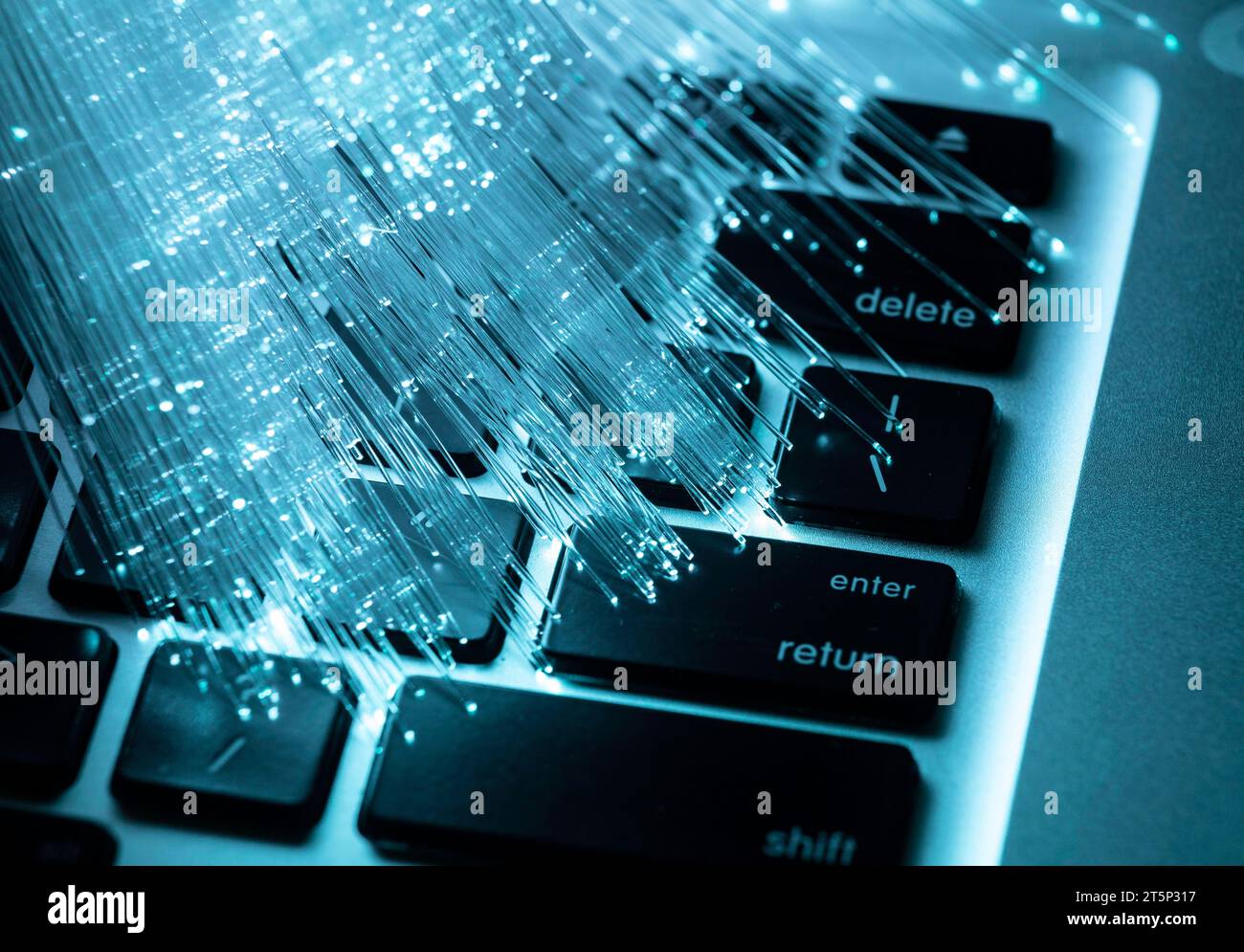 Blue optic fiber with laptop Stock Photo - Alamy