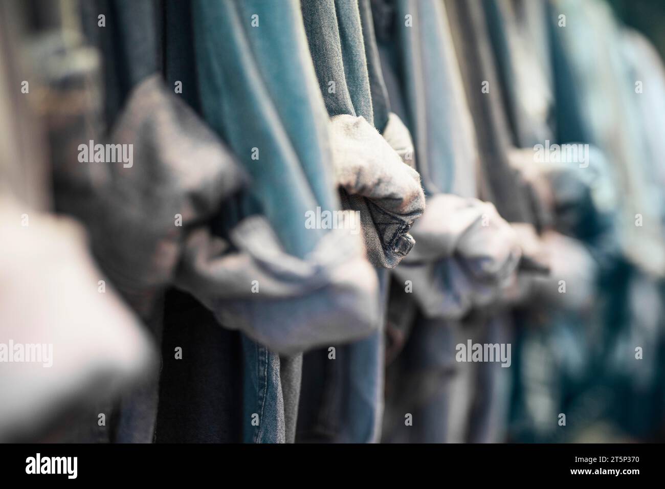 Folded sleeves hi-res stock photography and images - Alamy