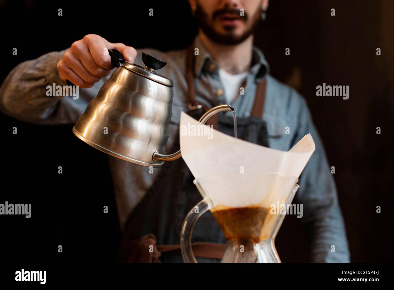 Man pouring aromatic coffee hi-res stock photography and images - Alamy