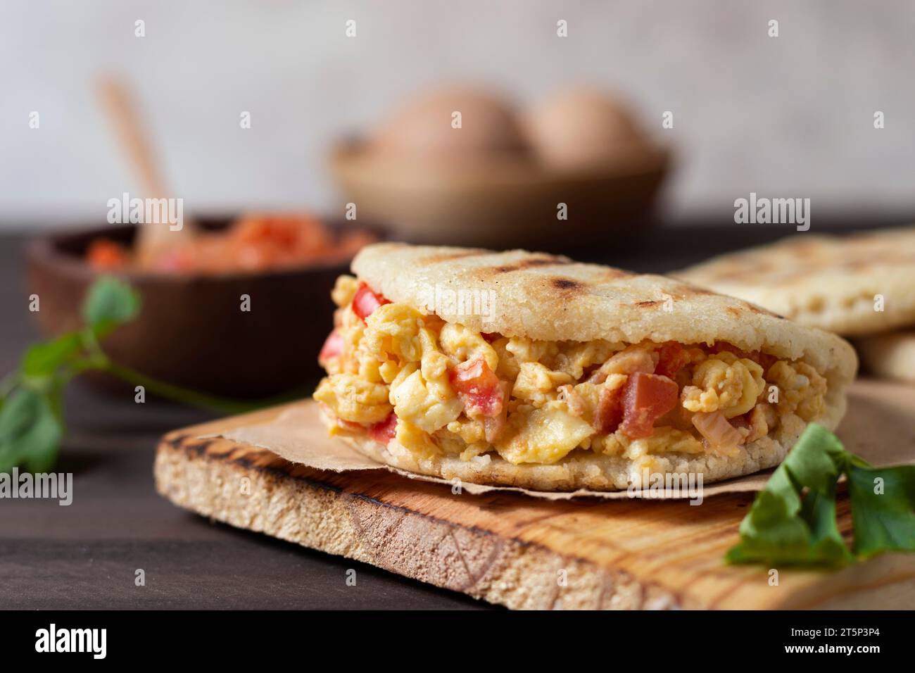 Delicious arepas with vegetables Stock Photo - Alamy