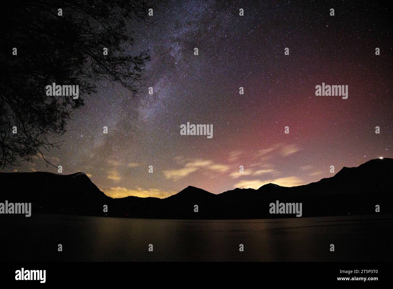 Walchensee, Germany. 05th Nov, 2023. Northern lights shimmer in the ...