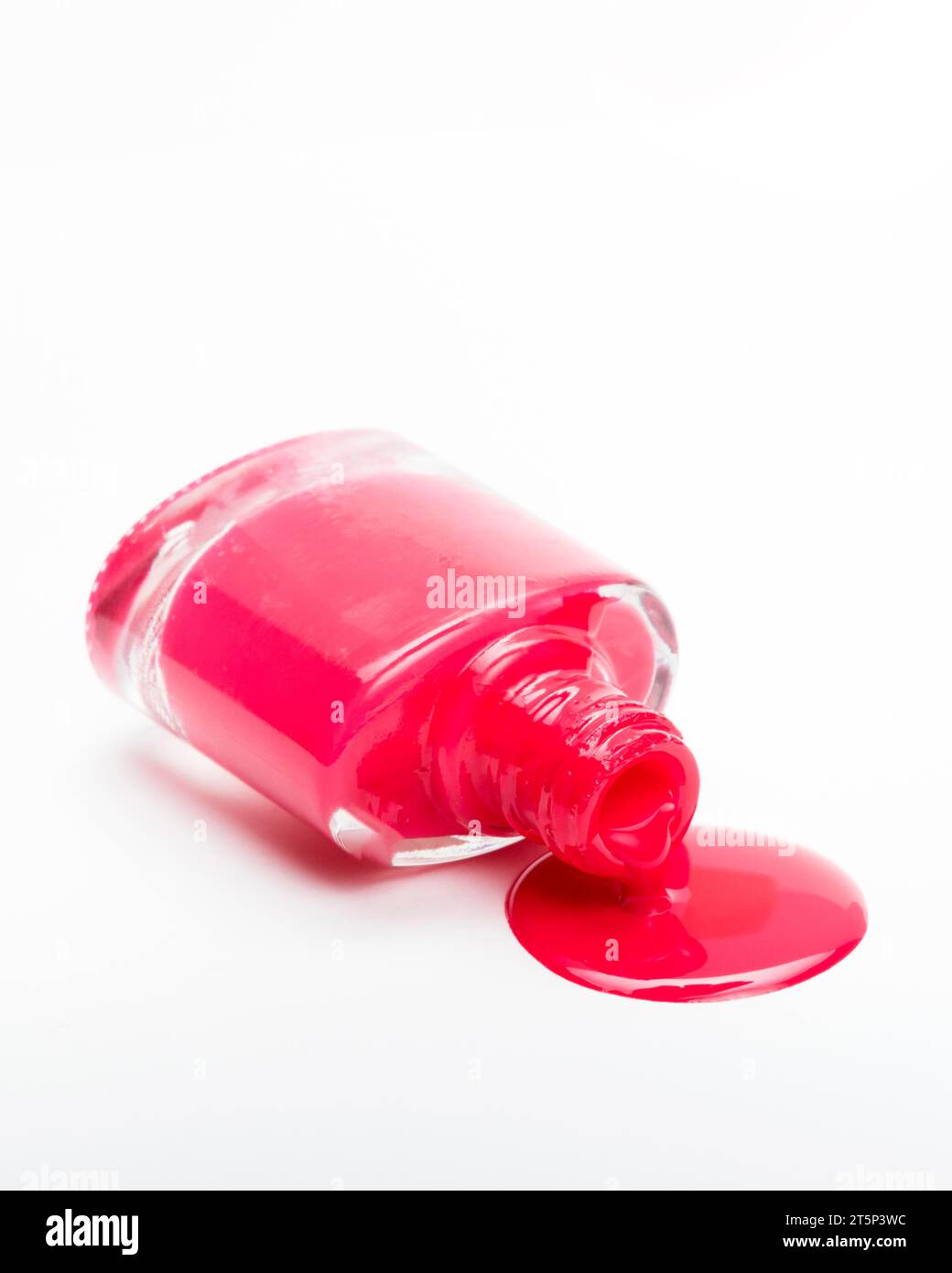 Dripping red nail polish white surface Stock Photo - Alamy