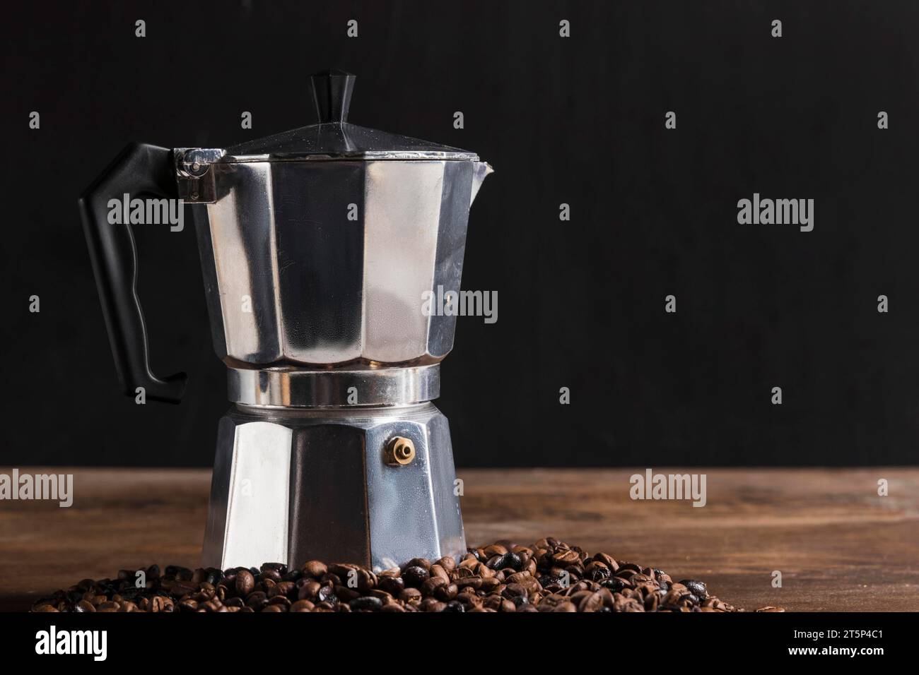 Geyser coffee maker near grains Stock Photo - Alamy