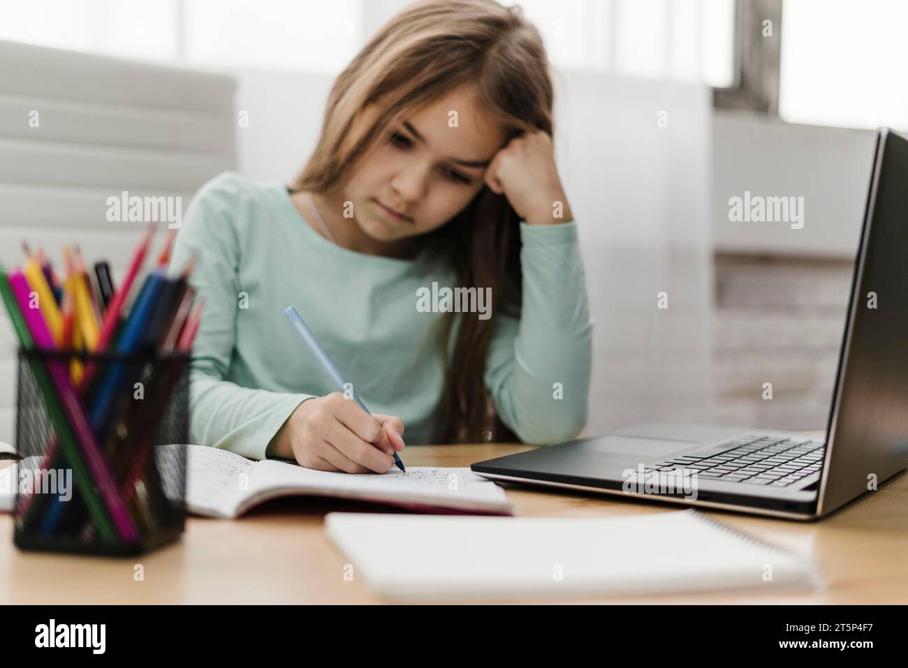 Online classes distance school girl hi-res stock photography and images ...