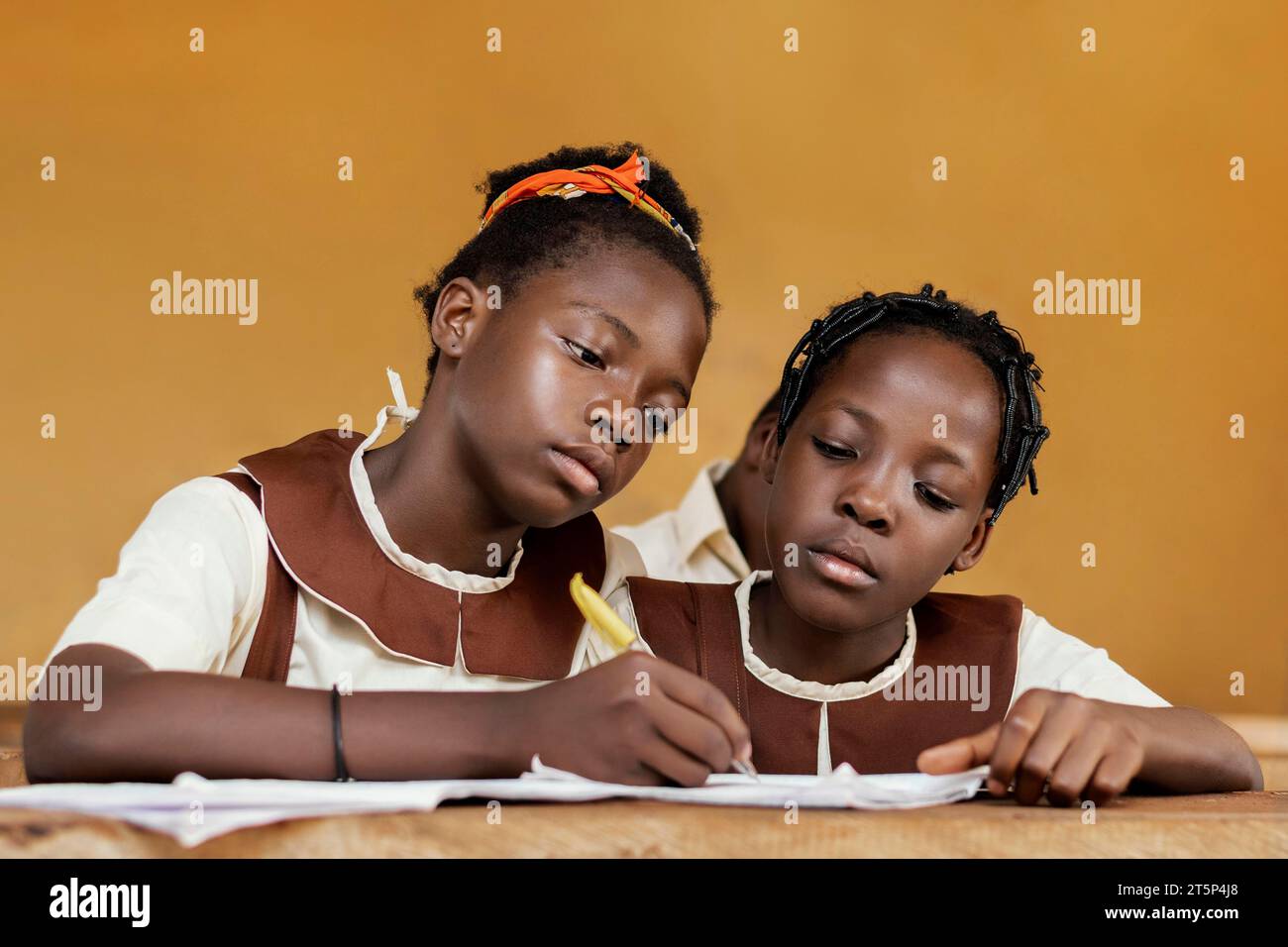 Group african kids learning together Stock Photo - Alamy