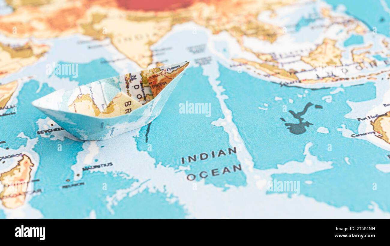 High angle paper boat world map Stock Photo - Alamy