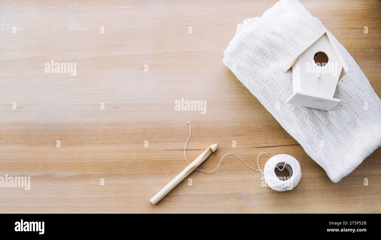 Knitted blanket small house Stock Photo - Alamy
