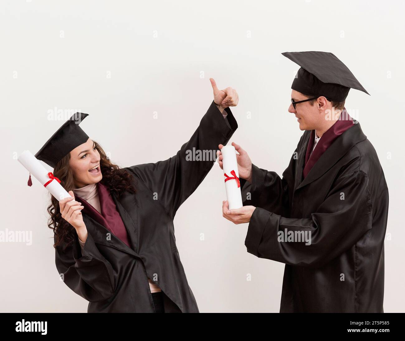 Medium shot graduate students Stock Photo - Alamy