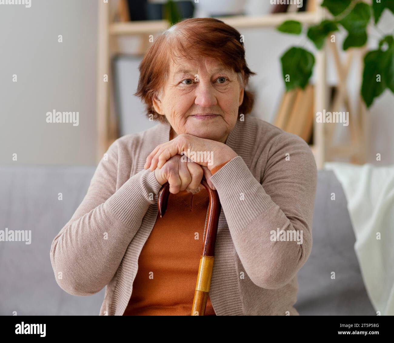 Medium shot smiley old woman Stock Photo - Alamy
