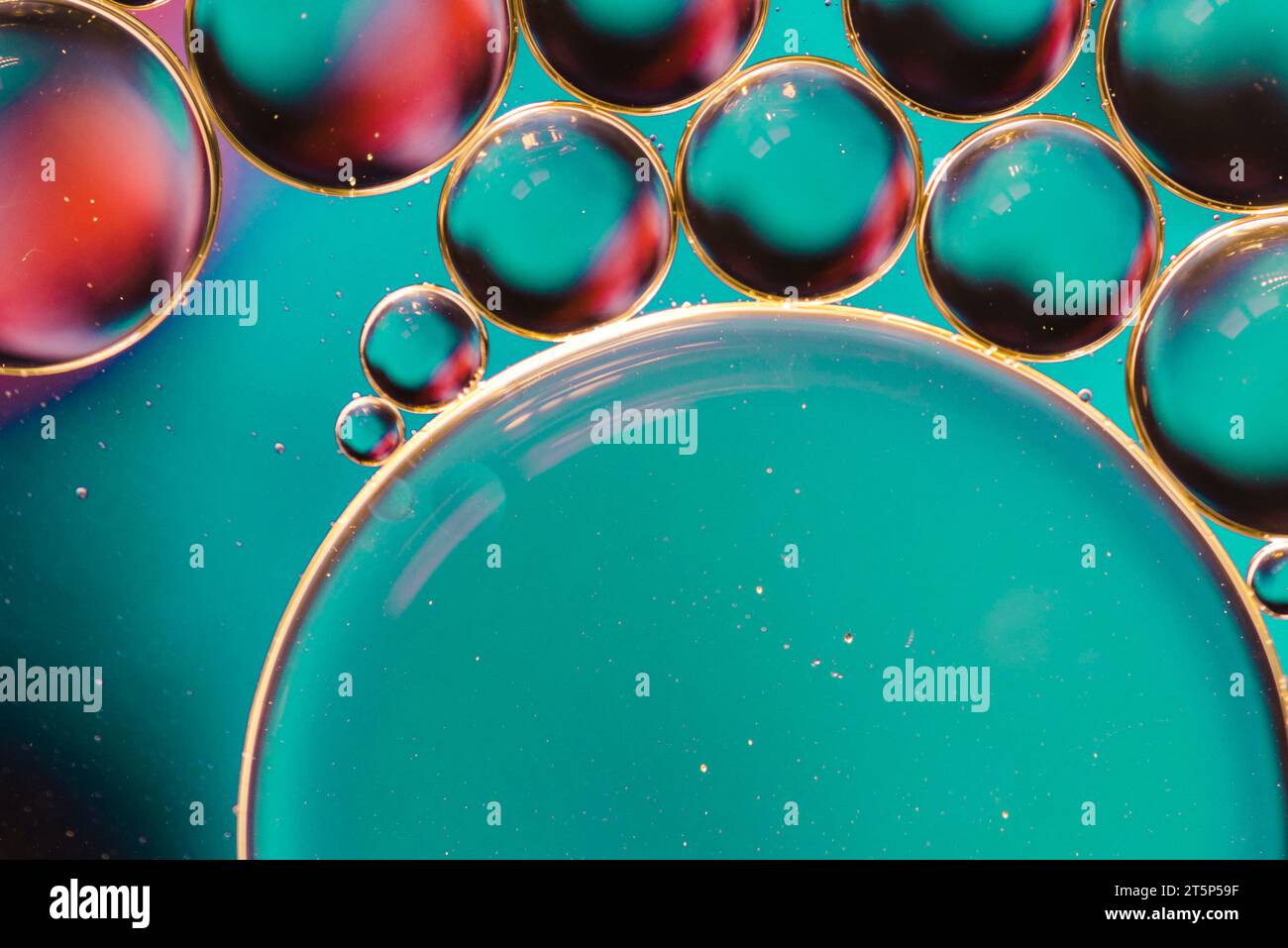 Mix colorful bubbles glass surface Stock Photo - Alamy