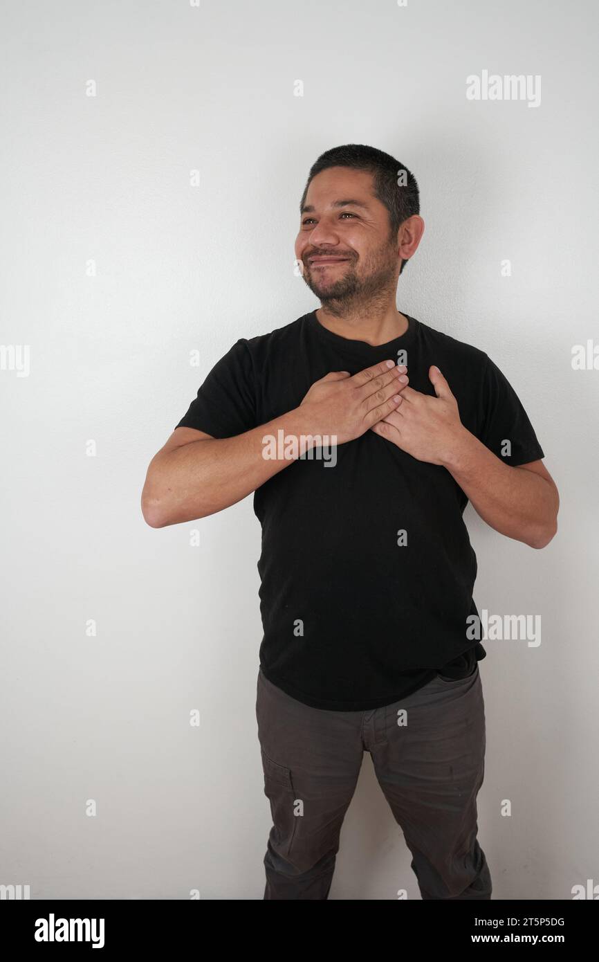 adiating Positivity: Man's Engaging Neutral Stance Stock Photo - Alamy