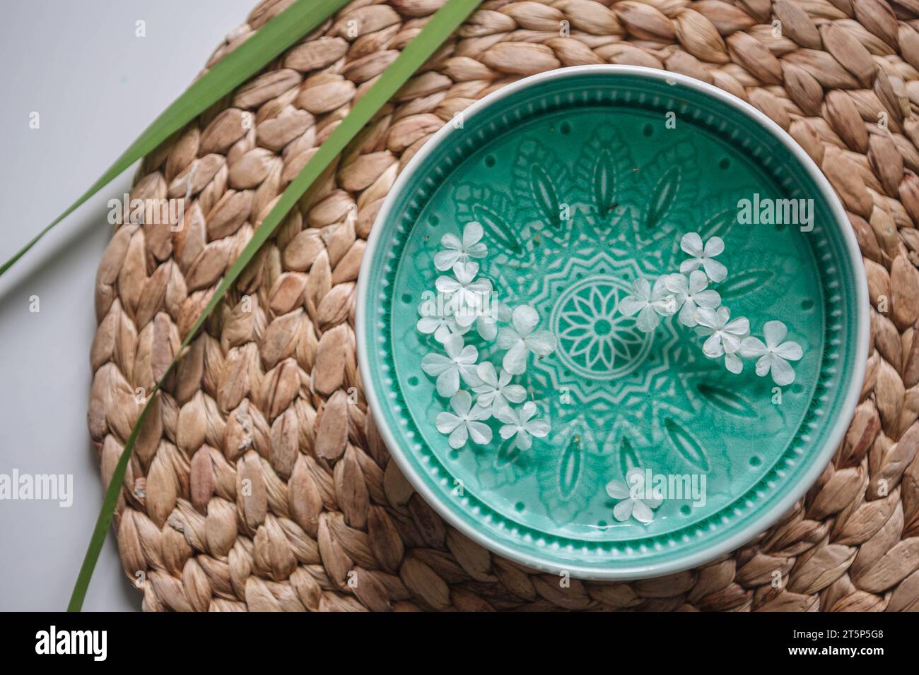 Natural elements spa with flowers Stock Photo - Alamy