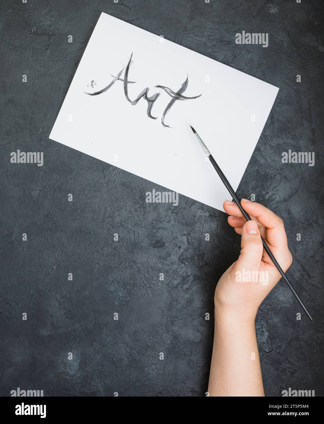 Person s hand written art text with paintbrush paper sheet Stock Photo ...