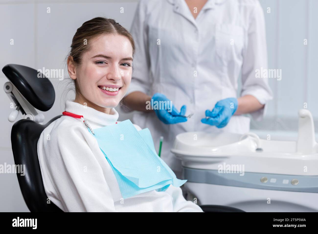 Portrait happy patient dentist Stock Photo - Alamy