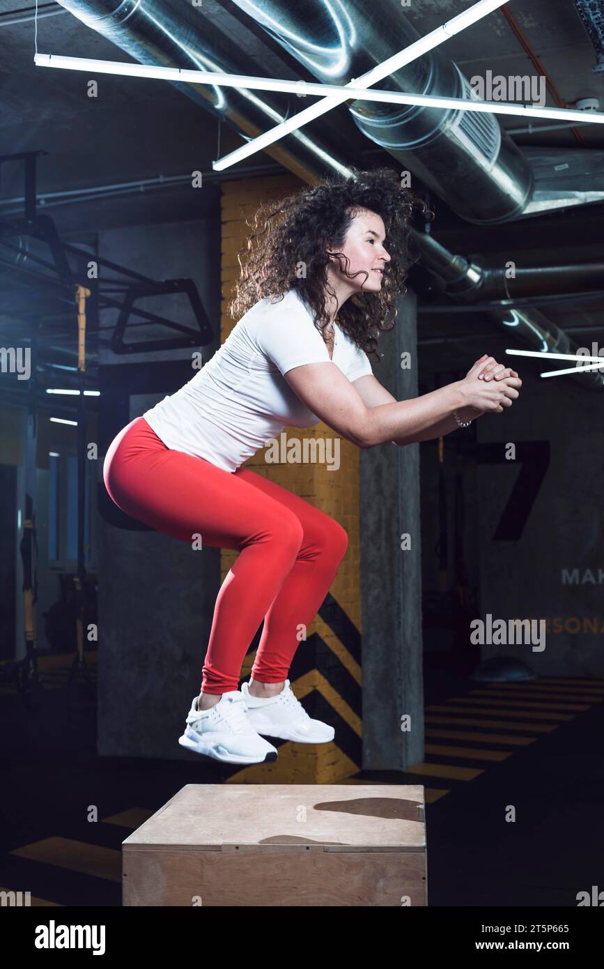 Squat box jump hi-res stock photography and images - Alamy