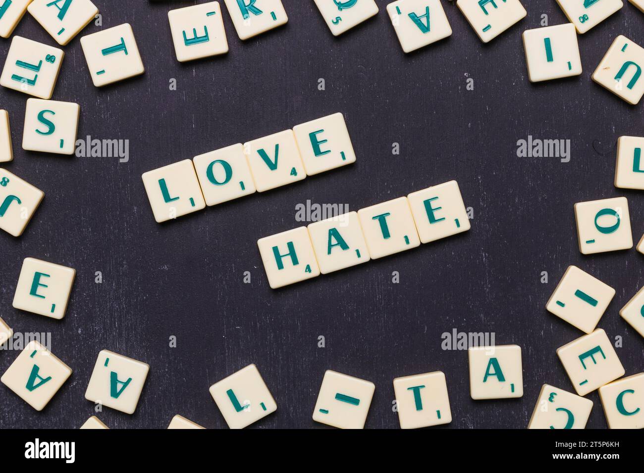 Top view love hate word black background Stock Photo - Alamy