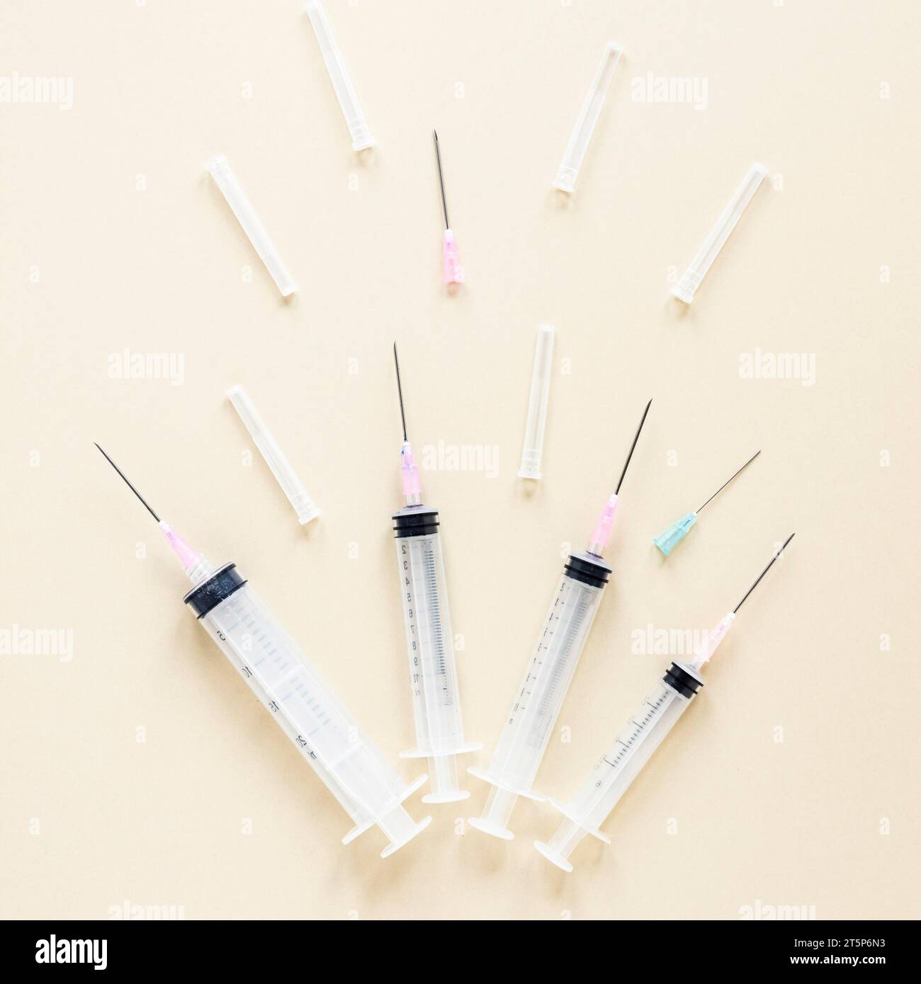 Top view variety syringes with needles table Stock Photo - Alamy