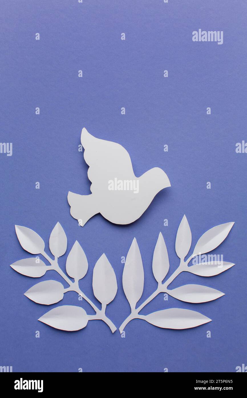 Top view paper dove with leaves copy space Stock Photo - Alamy