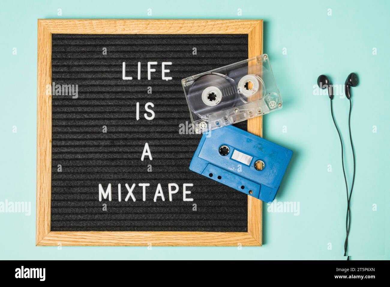 Transparent blue cassette tape message board with earphone turquoise ...