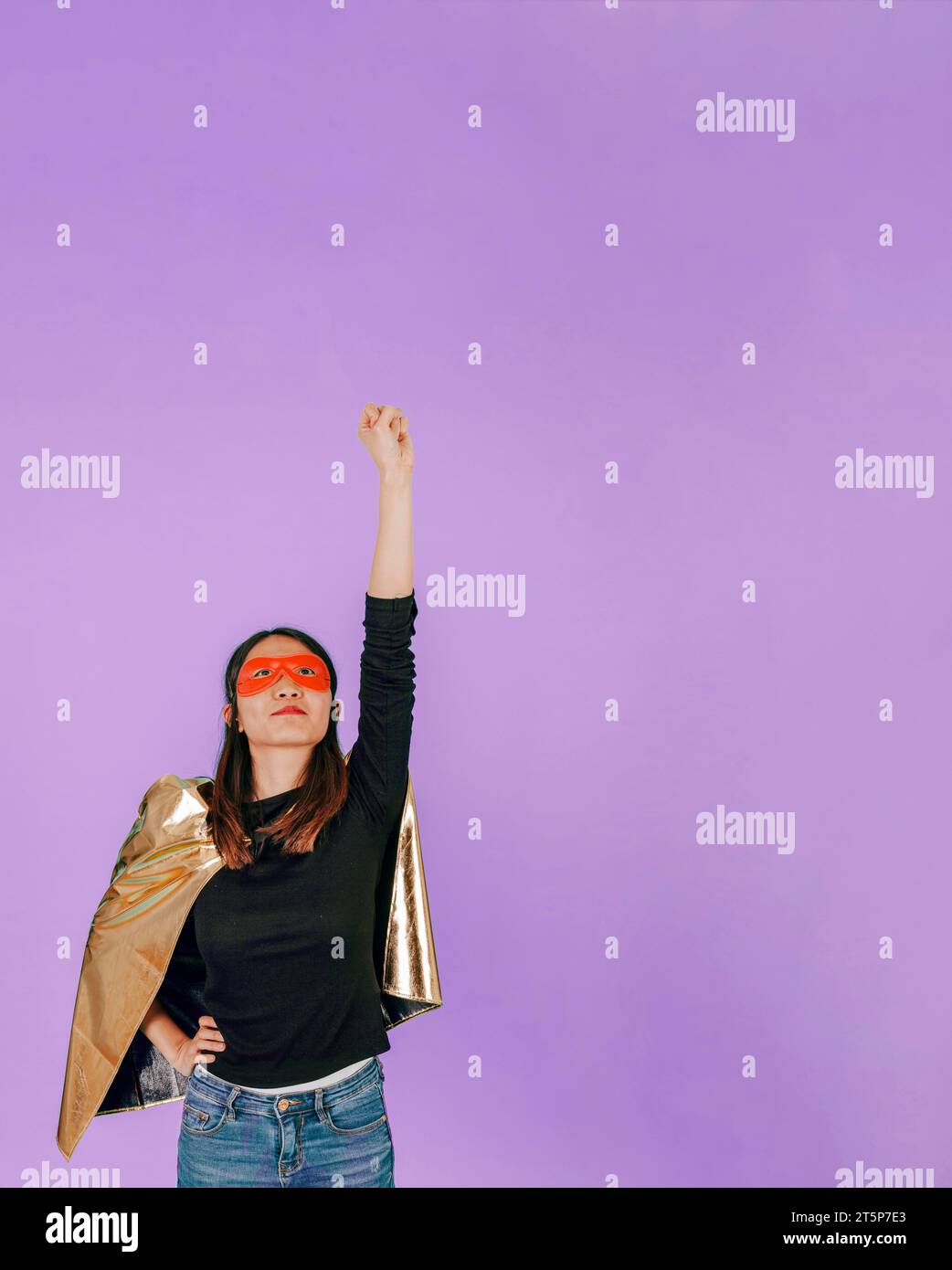 Asian superhero flying pose Stock Photo - Alamy