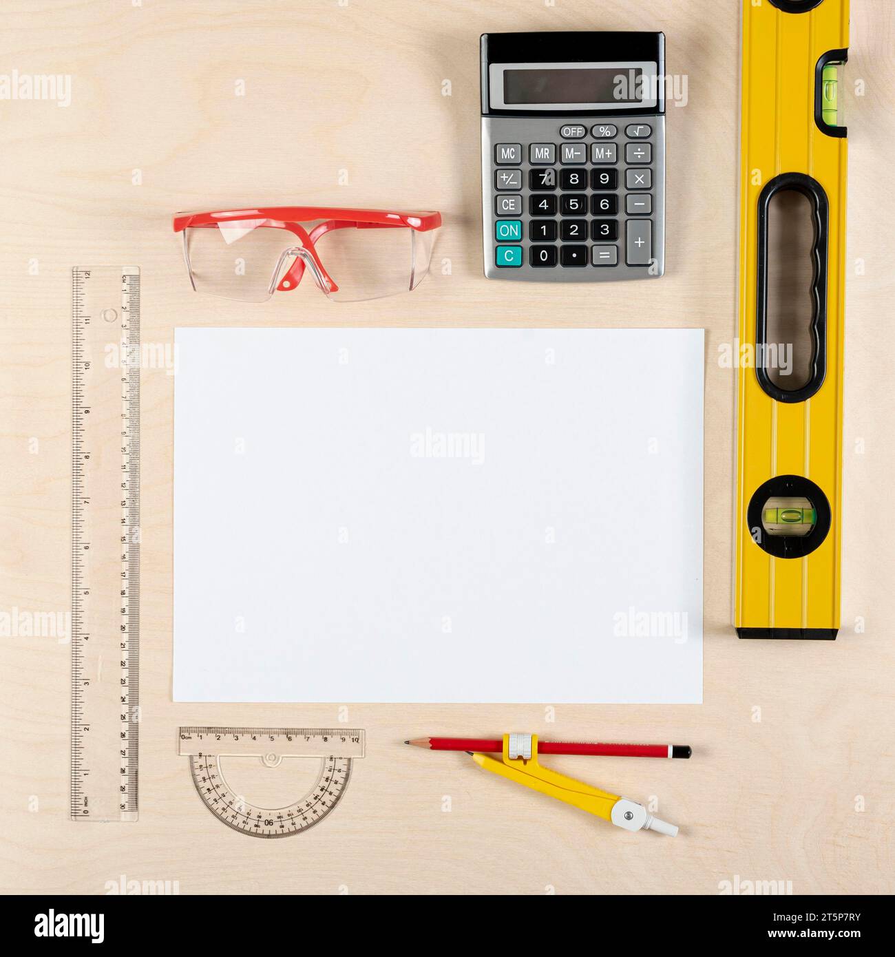 Builder desk with paper sheet flat lay Stock Photo - Alamy