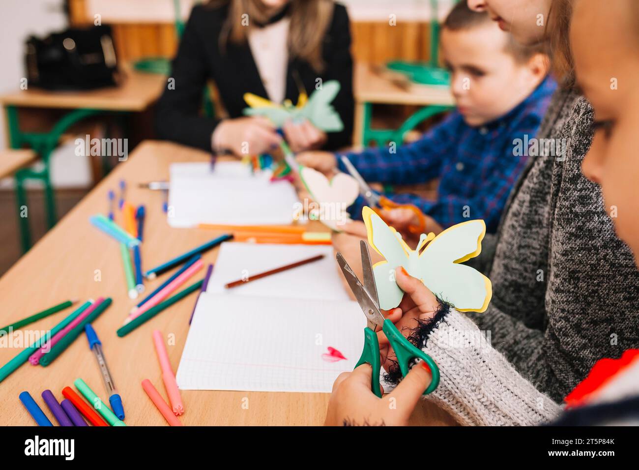 Cutting lesson school Stock Photo - Alamy