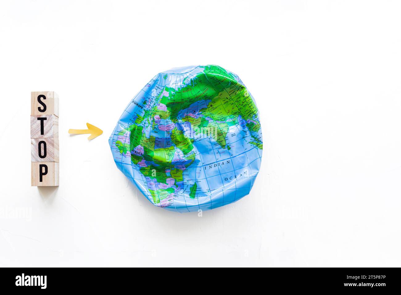 Deflated ball stop word cubes Stock Photo - Alamy