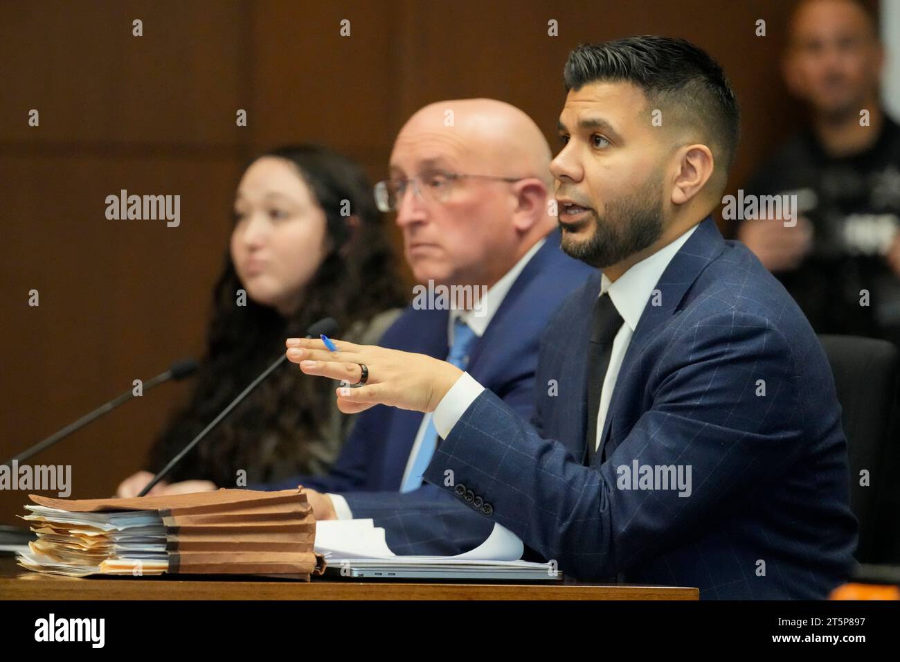 Attorney George Gomez, right, speaks as Robert E. Crimo Jr., appears ...