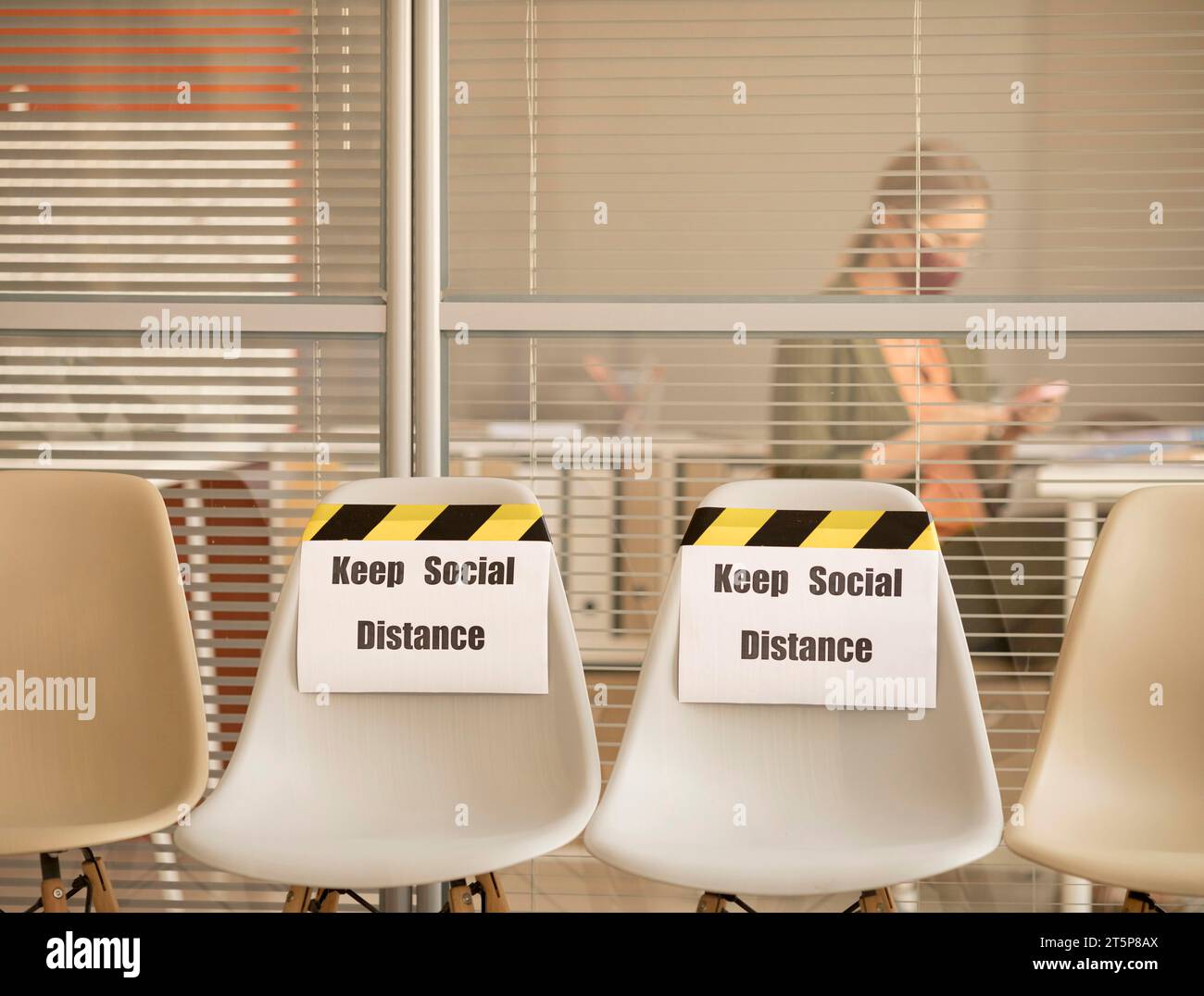 Empty seats with social distance sign work Stock Photo - Alamy