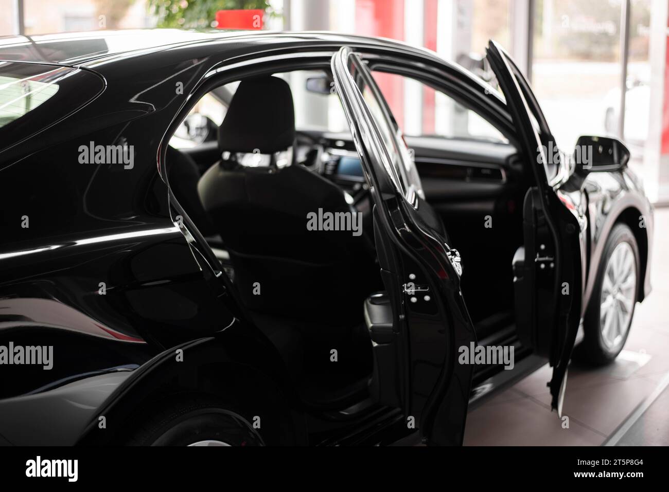 Front view black new car with doors opened Stock Photo - Alamy
