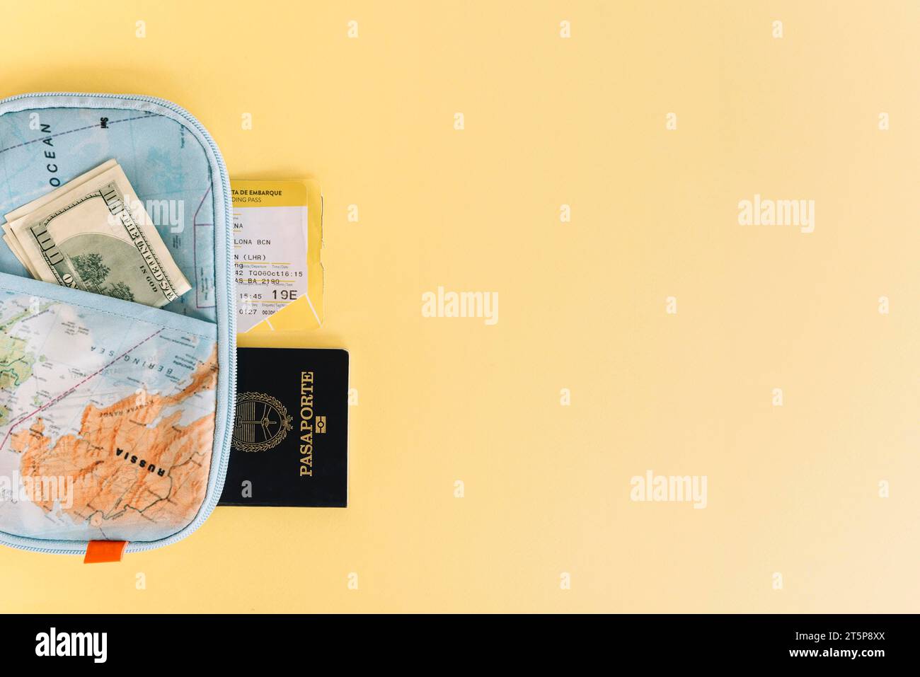 Map wallet with currency passport ticket yellow background Stock Photo ...