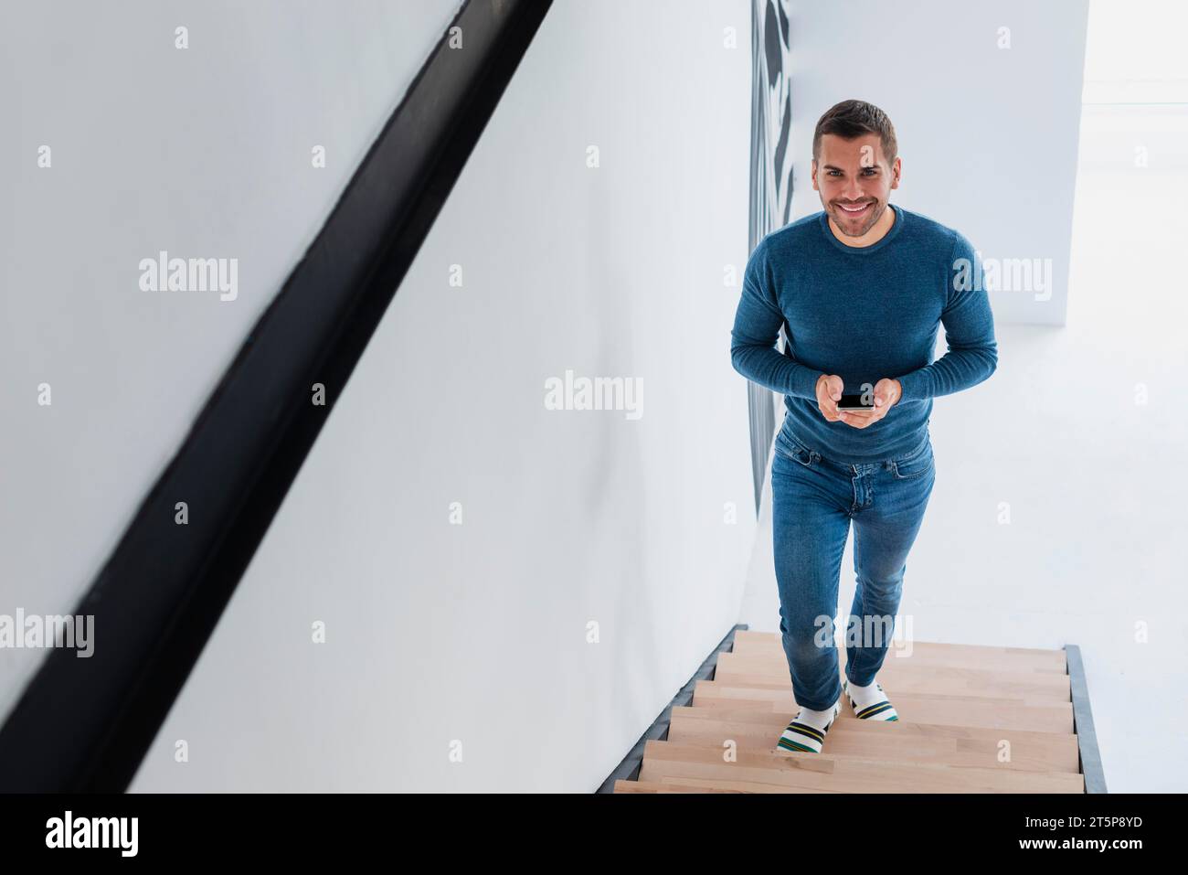 Man stairs hand hi-res stock photography and images - Alamy