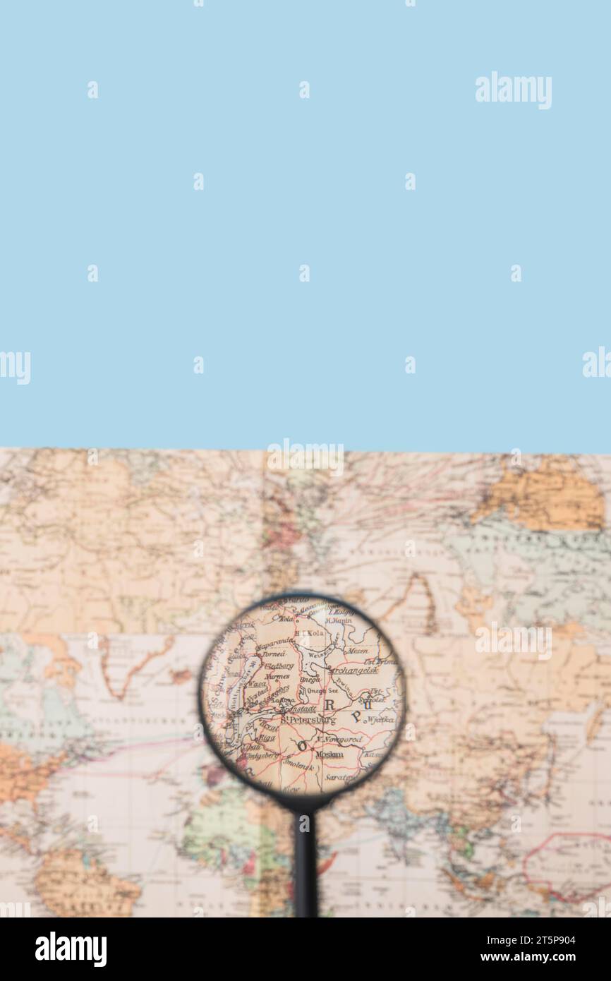 Magnifying glass world map Stock Photo - Alamy